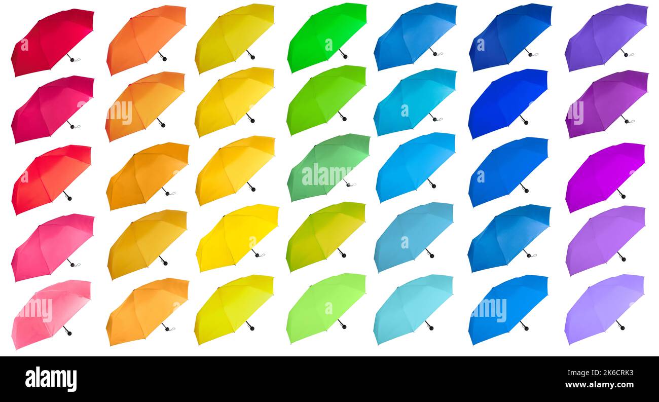 Large of rainbow colors umbrellas isolated on white background. Side ...
