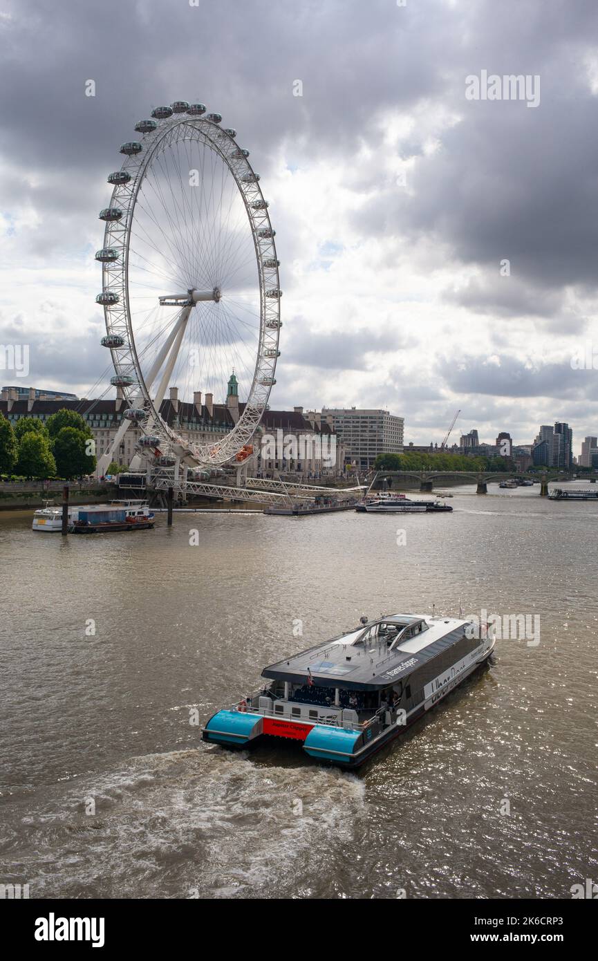 Jupiter Clipper by Thames Clippers Uber Boat passes by The London Eye ...