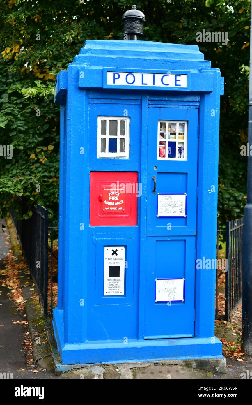 A vertical shot of a historic blue police box in Glasgow, Scotland ...