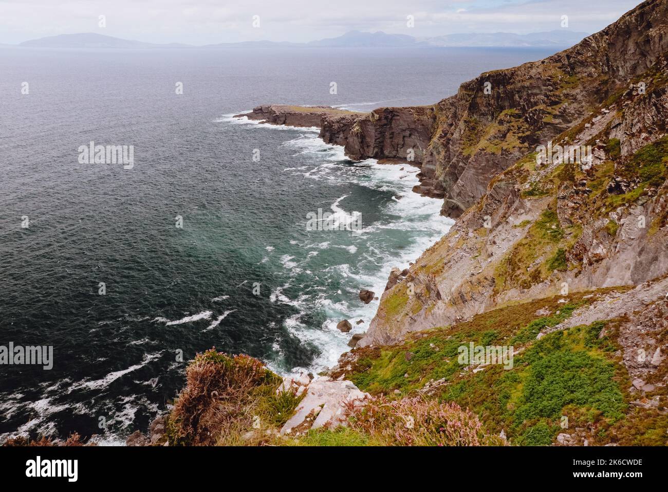 A beautiful landscape of a cliff facing the sea on a gloomy day in ...