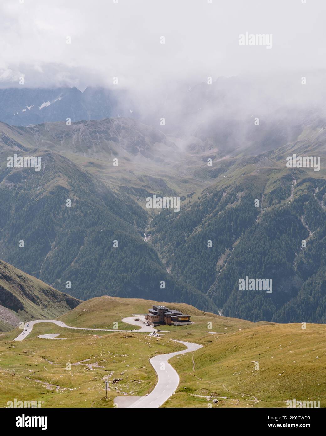 A beautiful landscape of green lofty Austrian Mountain and a lonely ...