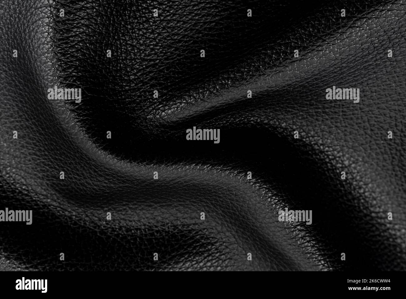 Black leather texture. Abstract background of dark leather with small ...