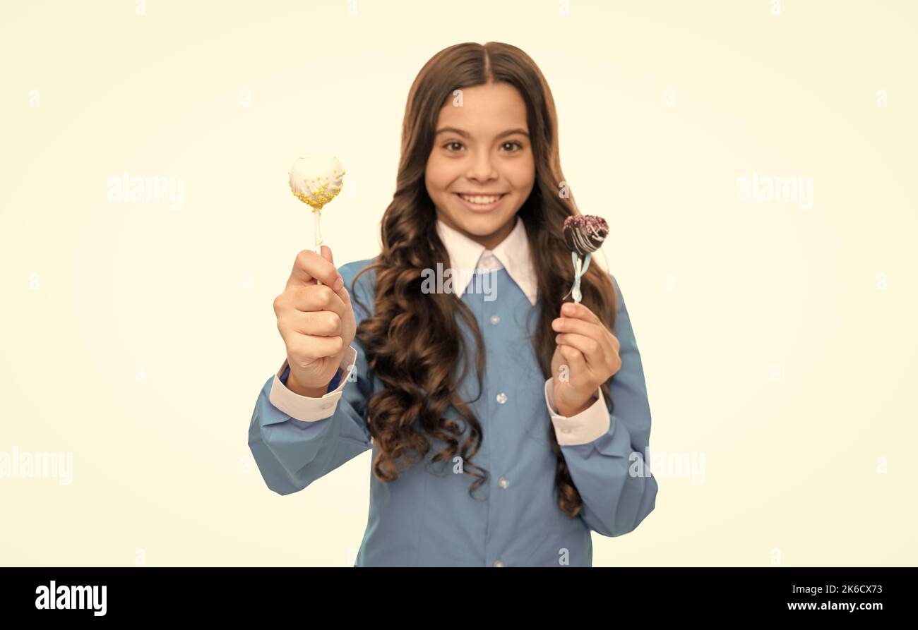 sweet chocolate candy in hand of teen girl with happy face, selective ...
