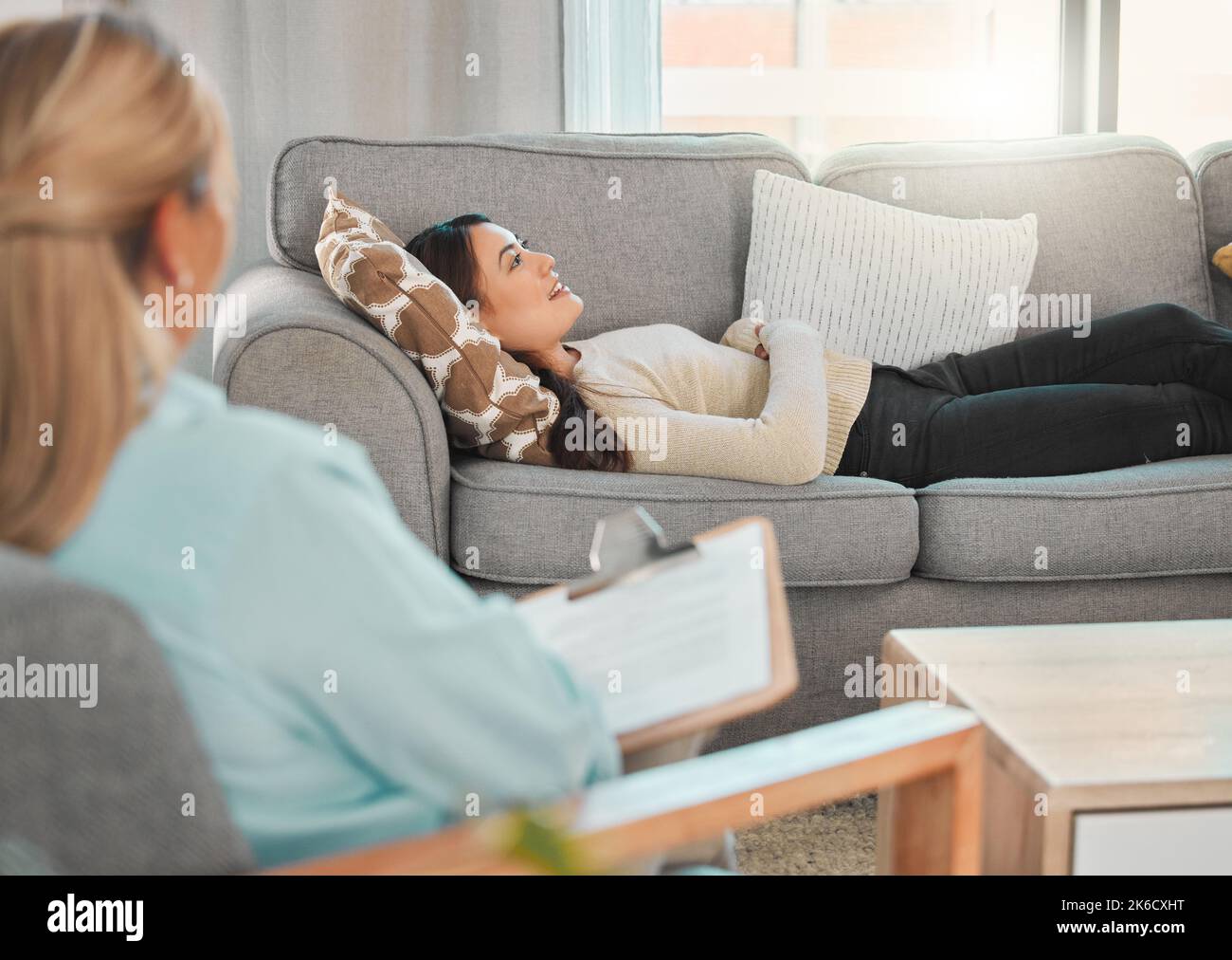 Mental health matters. a young woman lying on a couch during a ...