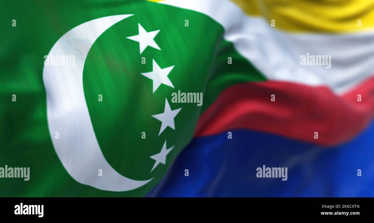 Close-up view of the Comoros national flag waving in the wind. The ...