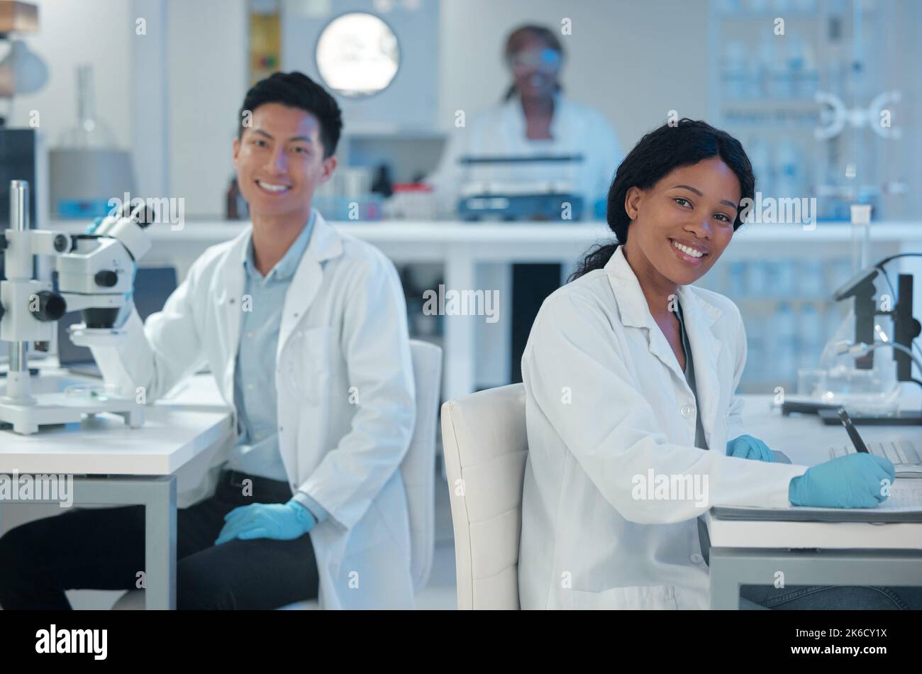 Working together to change the future. two lab workers together in ...