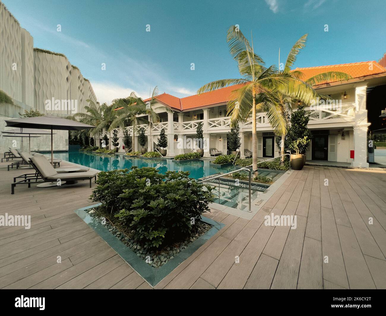 Luxury hotel with pool side and other amenities Stock Photo - Alamy