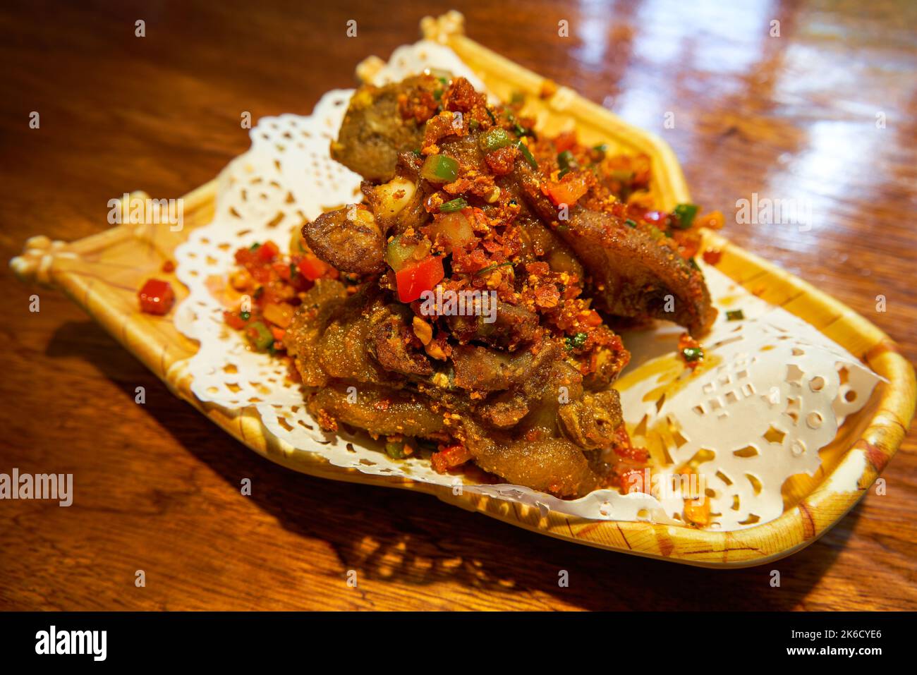 A delicious Guilin dish, crispy fried pork knuckle Stock Photo - Alamy