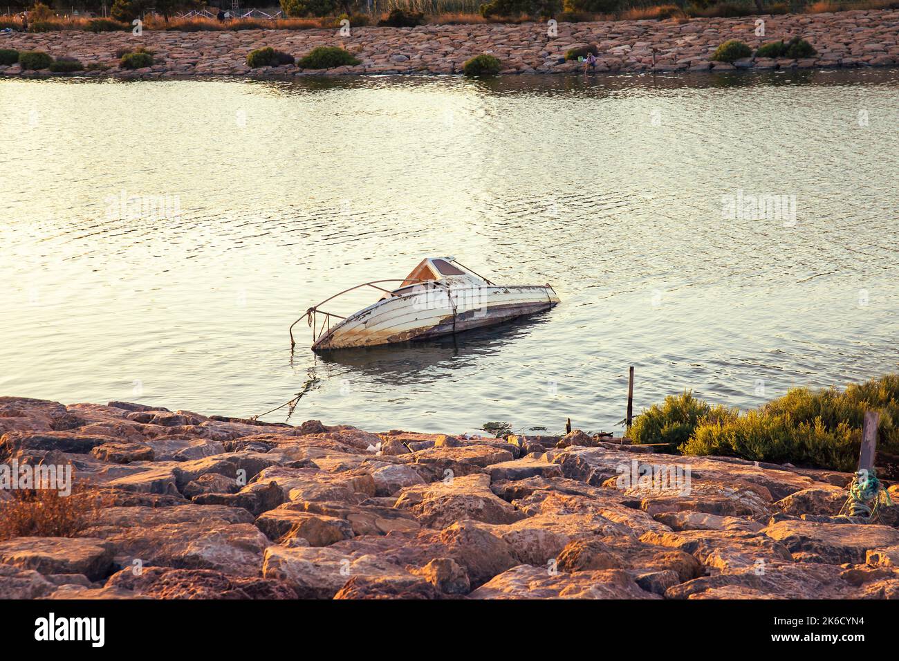 old small boat sunk in the river and abandoned Stock Photo - Alamy