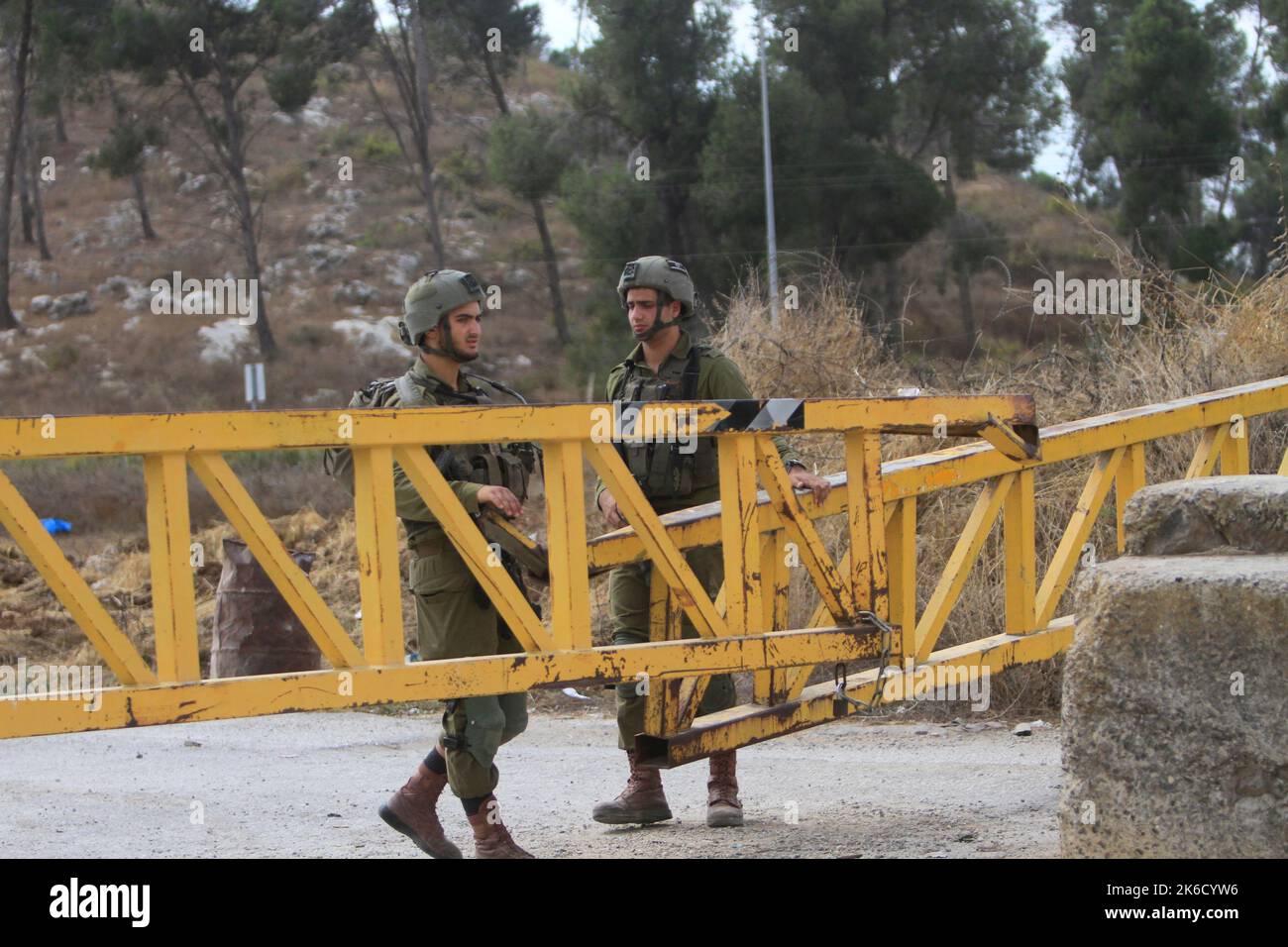 Israeli soldiers guard an entrance to the West Bank city of Nablus, following the killing of an ...