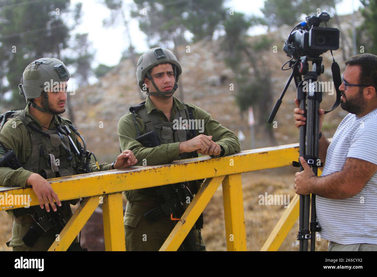 Israeli soldiers guard an entrance to the West Bank city of Nablus, following the killing of an ...