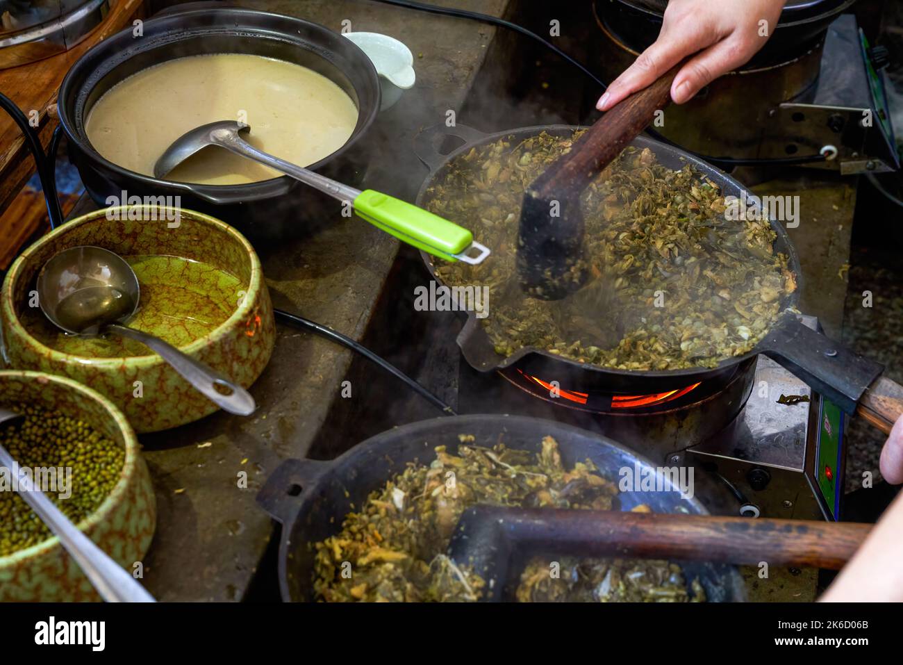 Guilin traditional chef is making oil tea Stock Photo - Alamy