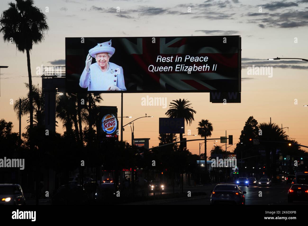 A billboard honoring Queen Elizabeth II with the words "Rest in Peace ...