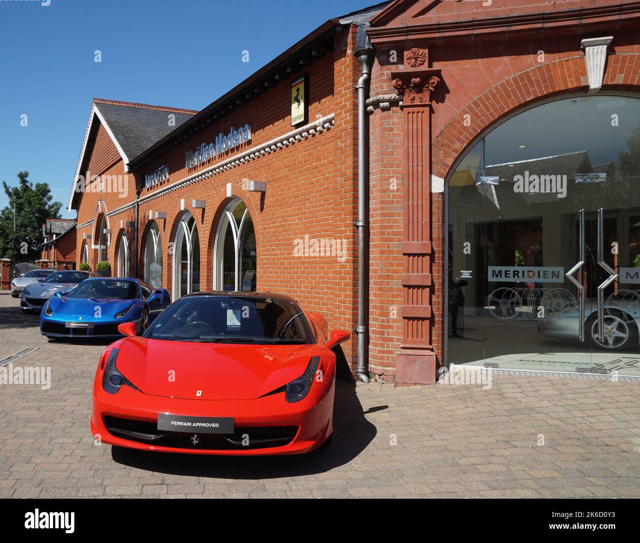 Ferrari 458 Italia on display outside showroom of Meridien Modena ...
