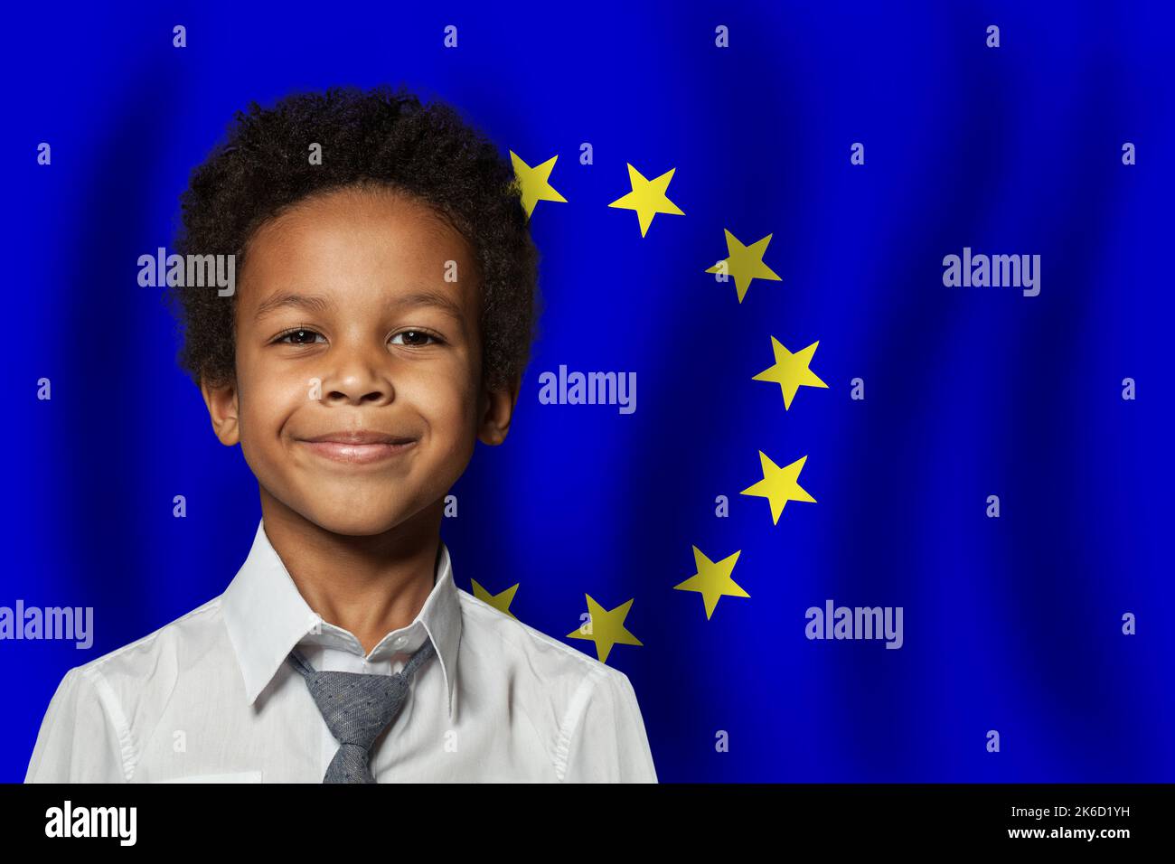 European kid boy on flag of European Union background. Education and ...