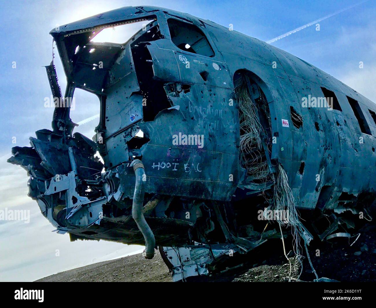 A vertical shot of a Plane wreck DC-117 D 1973 US NAVY Stock Photo - Alamy