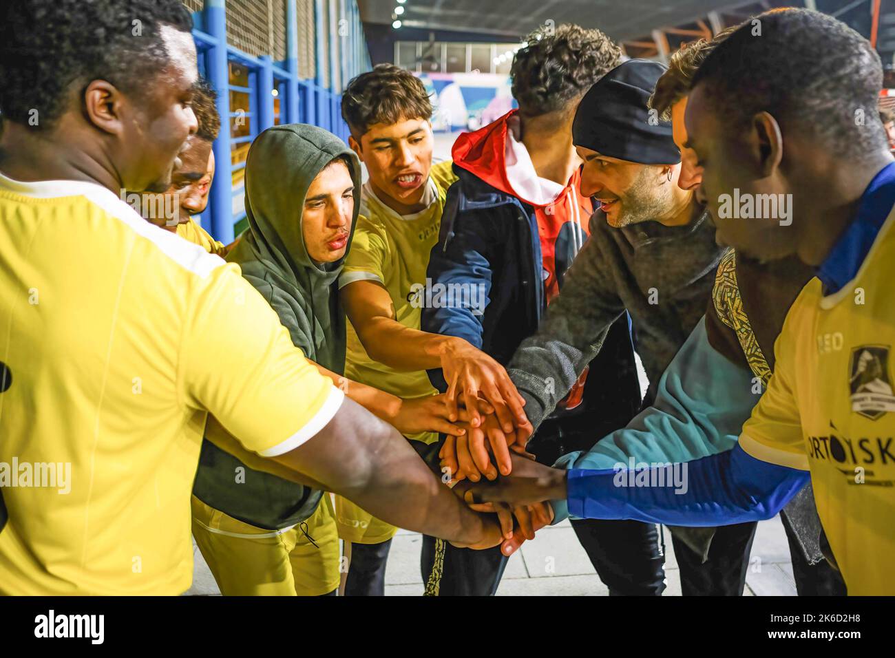 The soccer team cheers during a night training. Street Soccer Barcelona ...