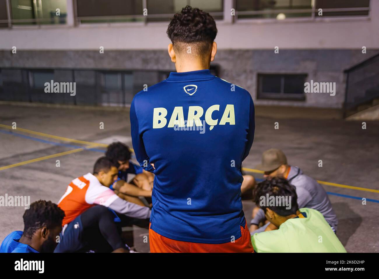 Moha, from Morocco, is seen wearing a "BarÁa" t-shirt during a training ...
