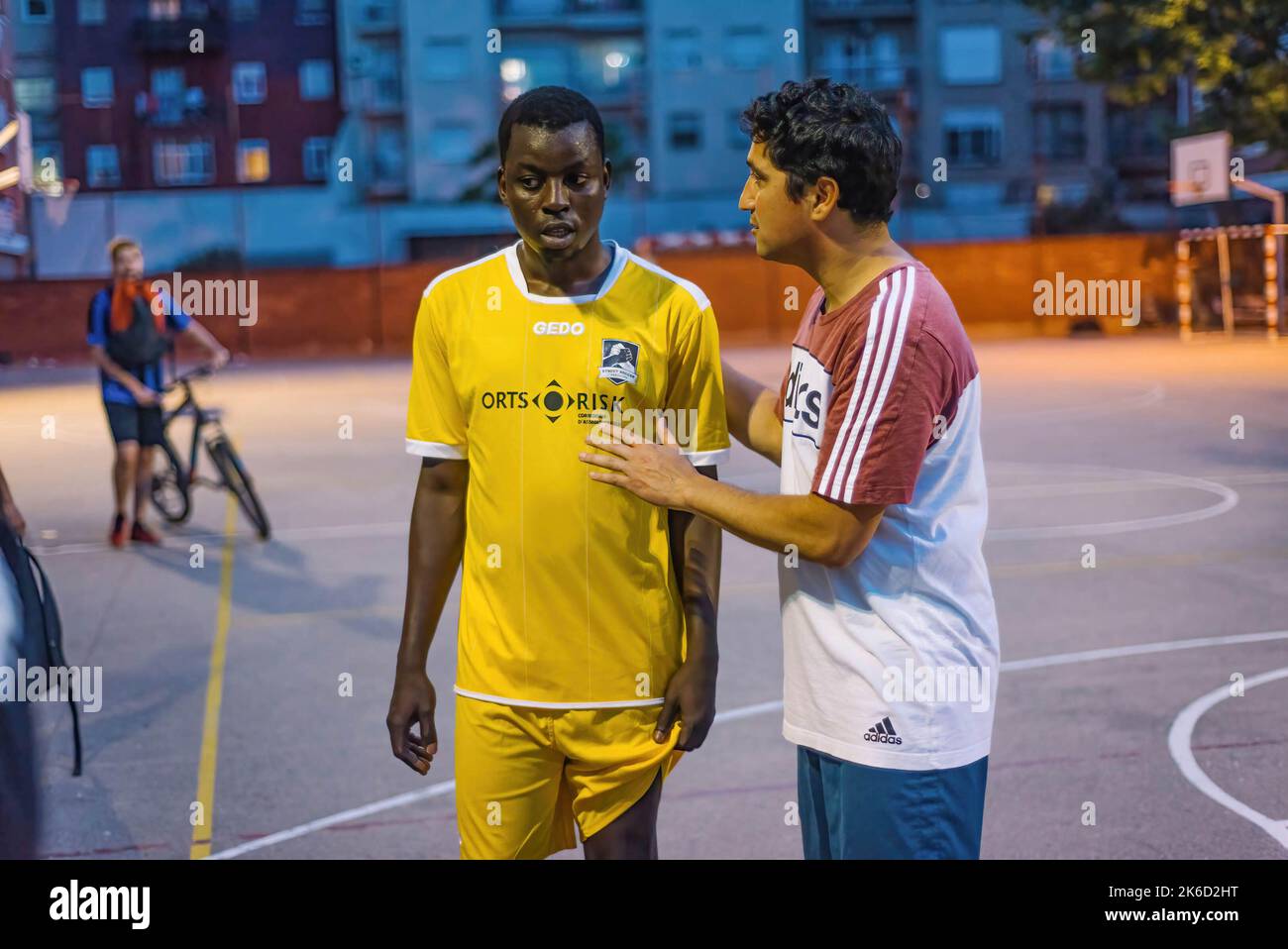 Sekou, from Guinea, receives directions from the coach during training ...