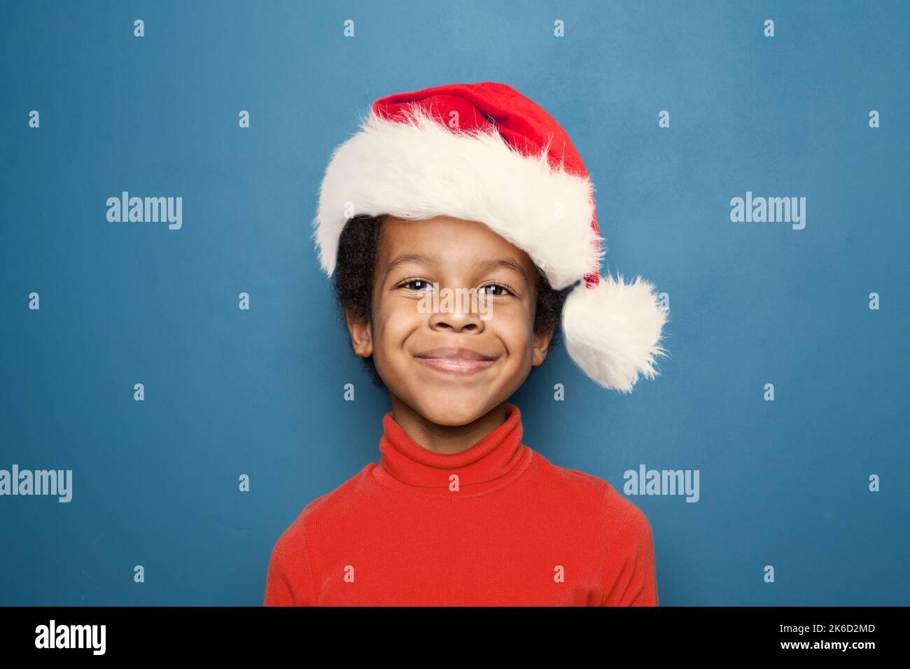 Happy child portrait. Little african american kid boy in Santa hat on ...