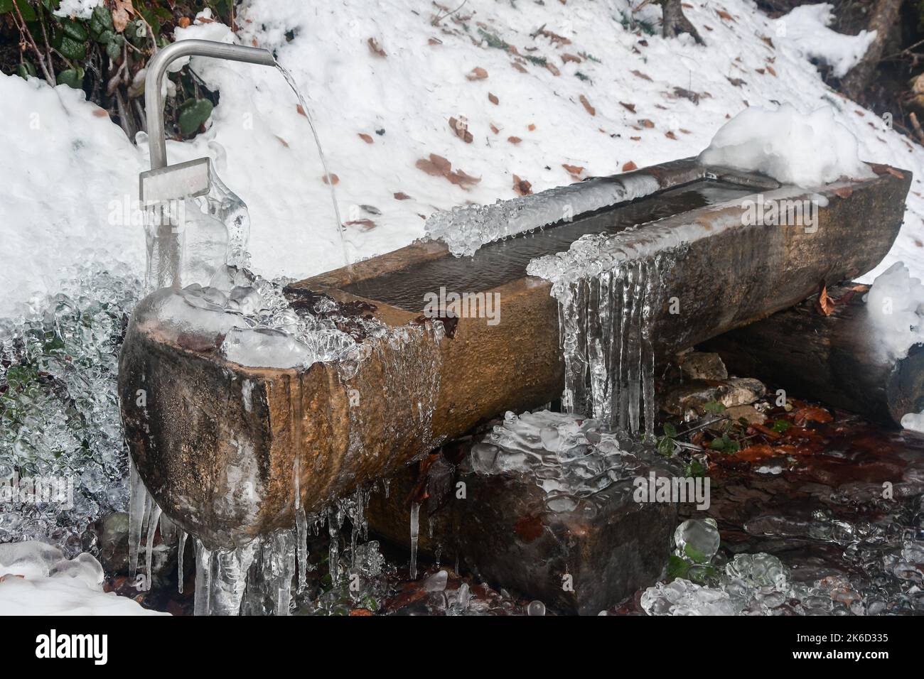 Frozen water on fresh water drinking supply in winter Stock Photo - Alamy