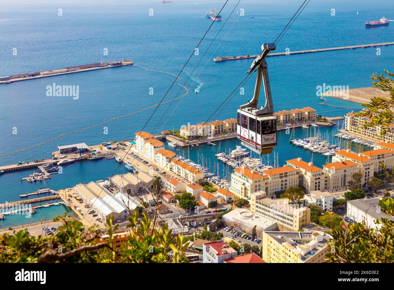 Gibraltar Cable Car with view of the Bay of Gibraltar and port in ...