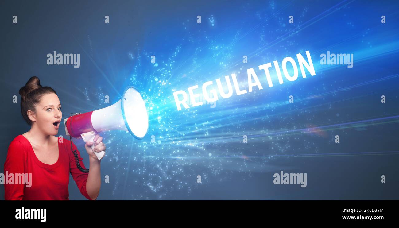 Young person shouting in loudspeaker Stock Photo - Alamy