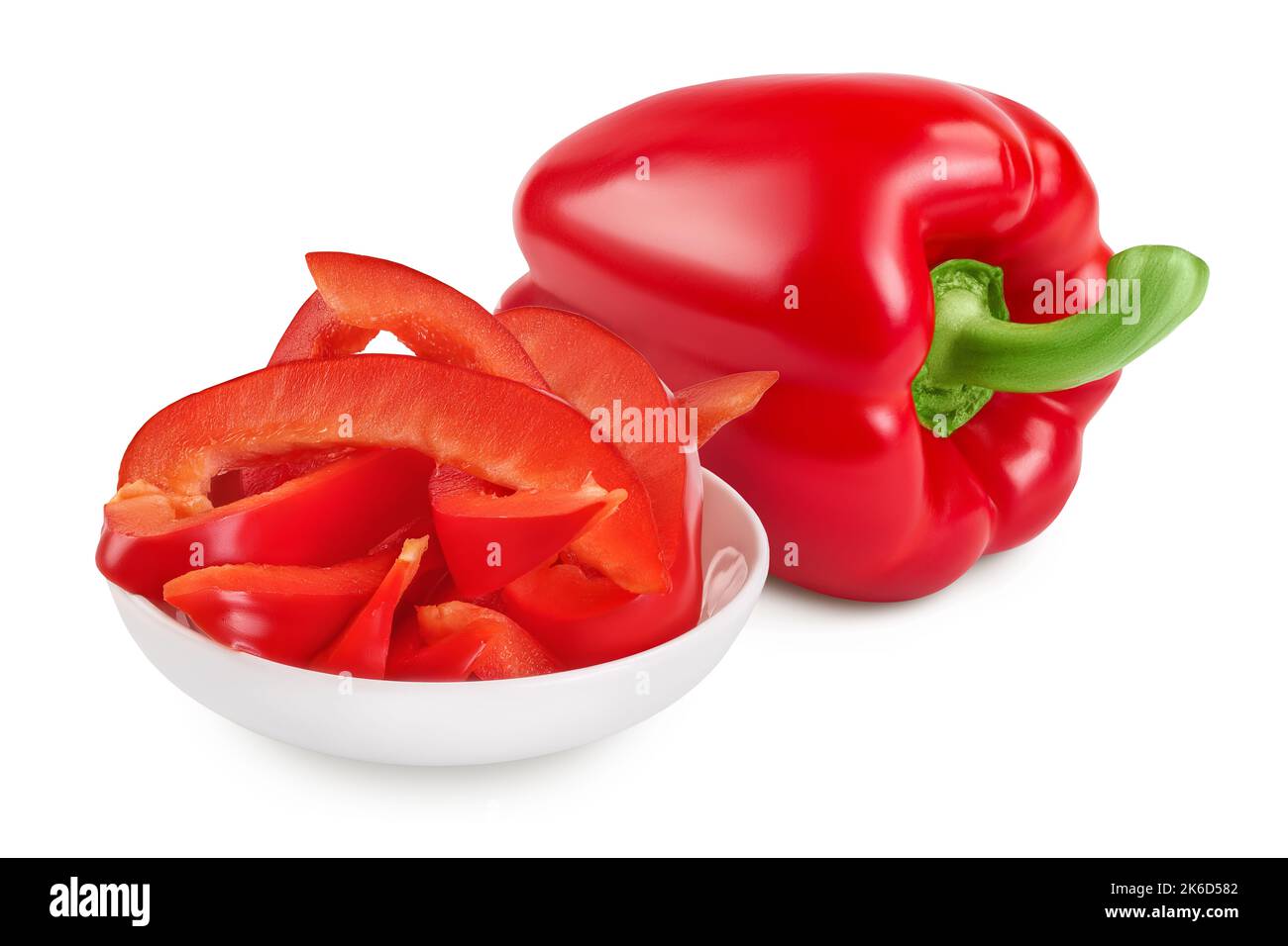 slices of red sweet bell pepper in ceramic bowl isolated on white ...