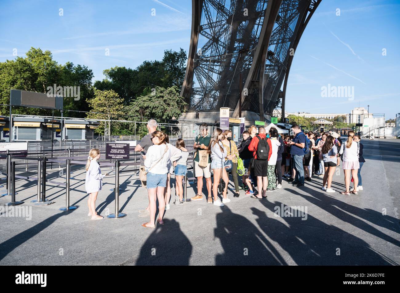 Paris, France - August 27 2022: People queueing to go up the Eiffel ...