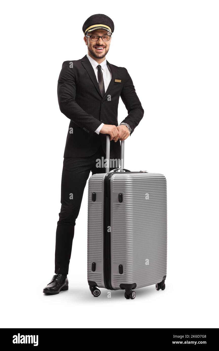 Full length portrait of a pilot in a uniform standing with a suitcase ...