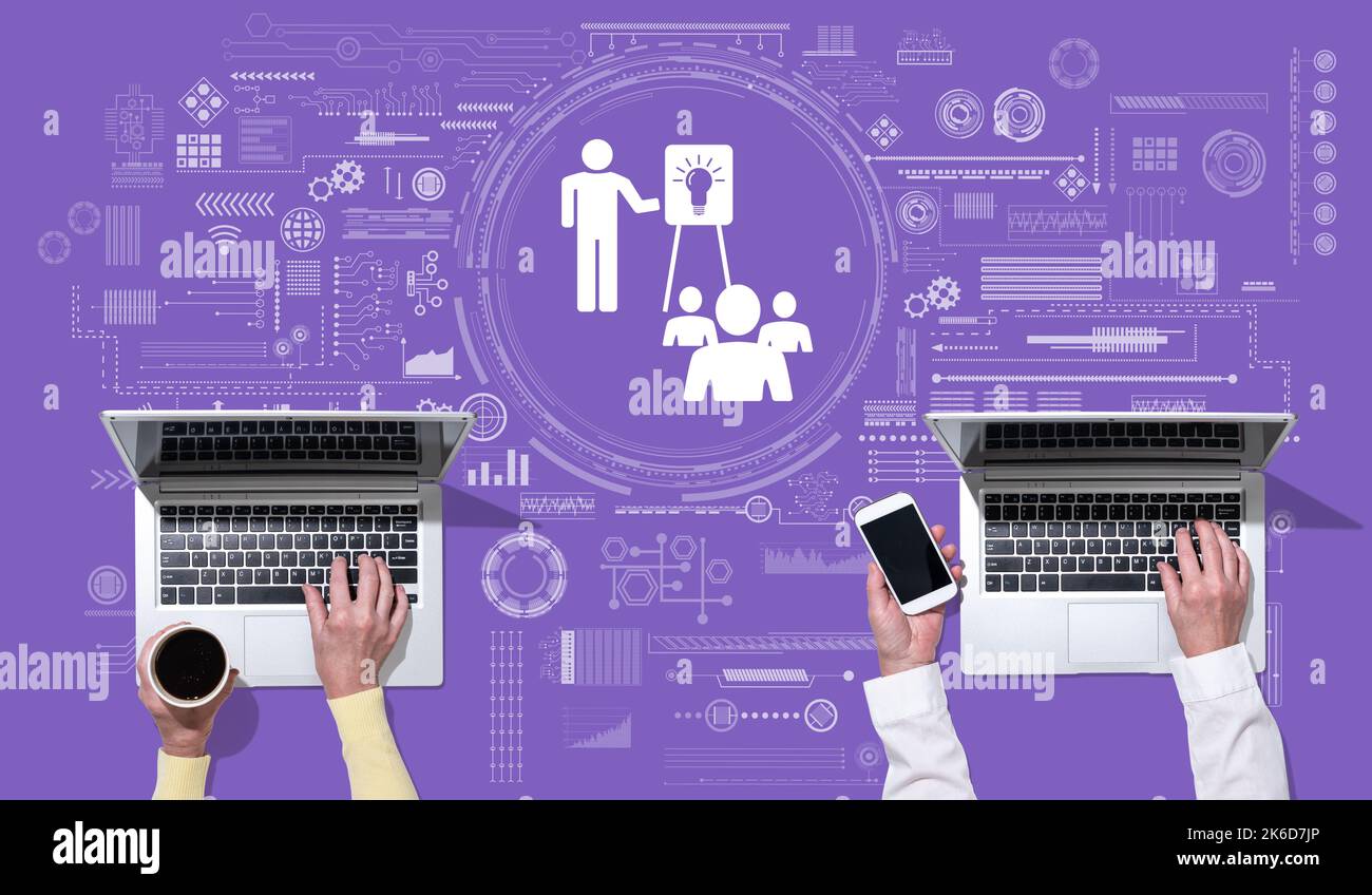 Top view of hands using laptop with symbol of knowledge sharing concept ...