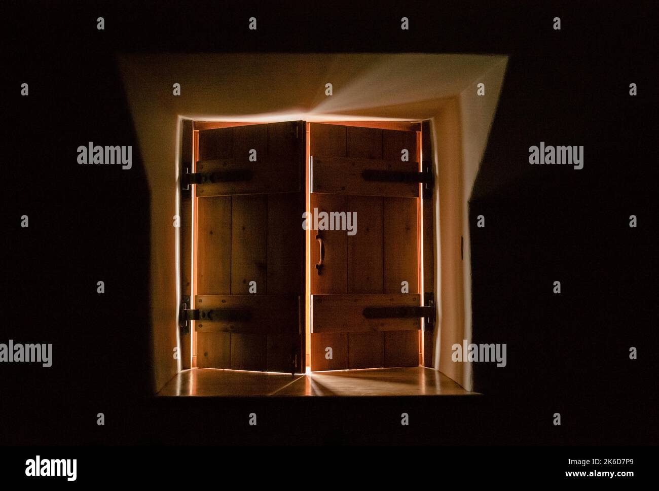light spilling through two wooden window shutters Stock Photo - Alamy