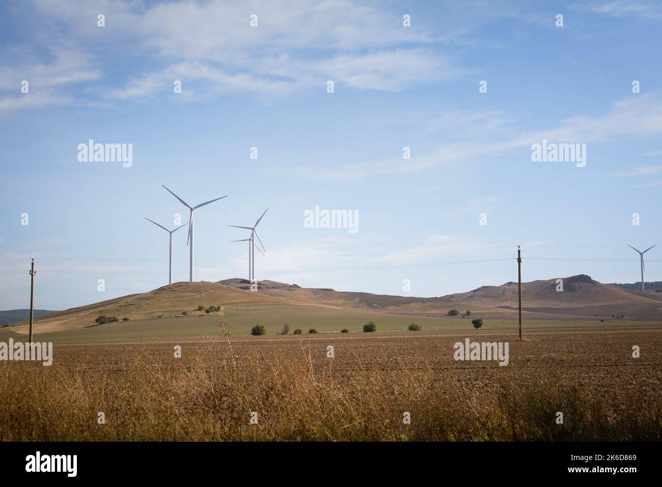 Wind turbines on the hill. Beautiful mountain landscape with wind ...