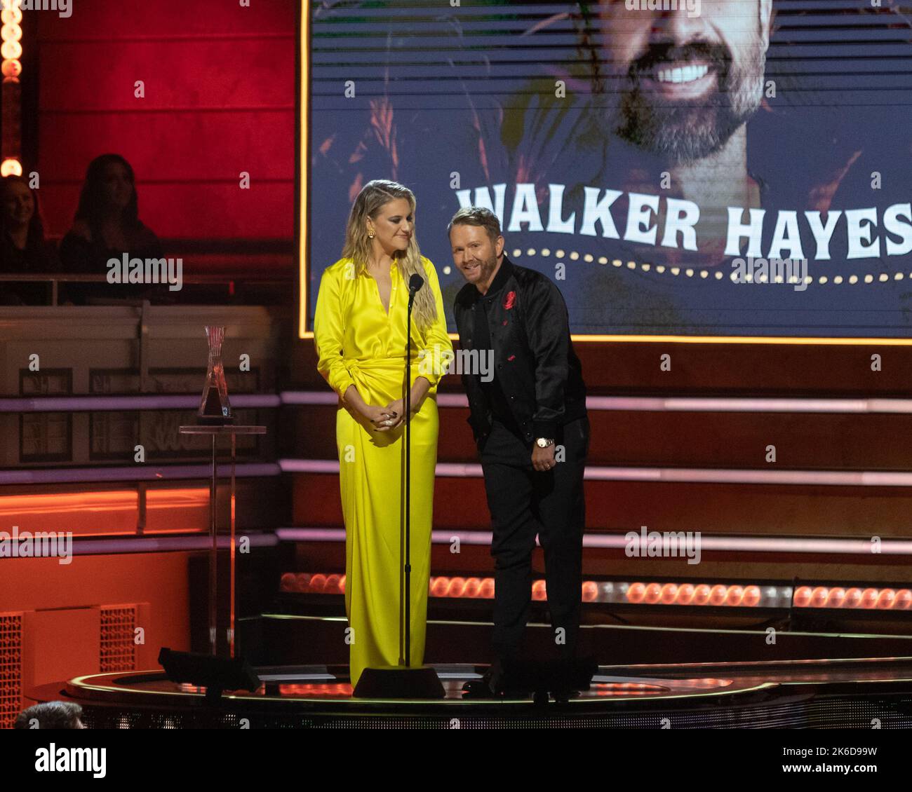 Kelsea Ballerini (L) and Shane McAnally (R) present on stage at the CMT ...