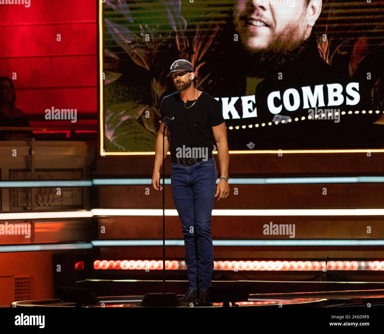 Riley Green presents on stage at the CMT Artists of the Year at ...