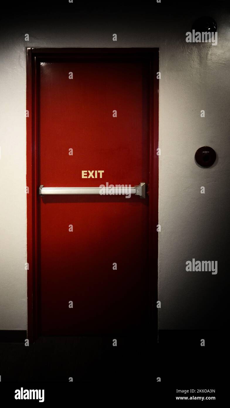 Emergency fire exit door and red color and white wall in building Stock ...