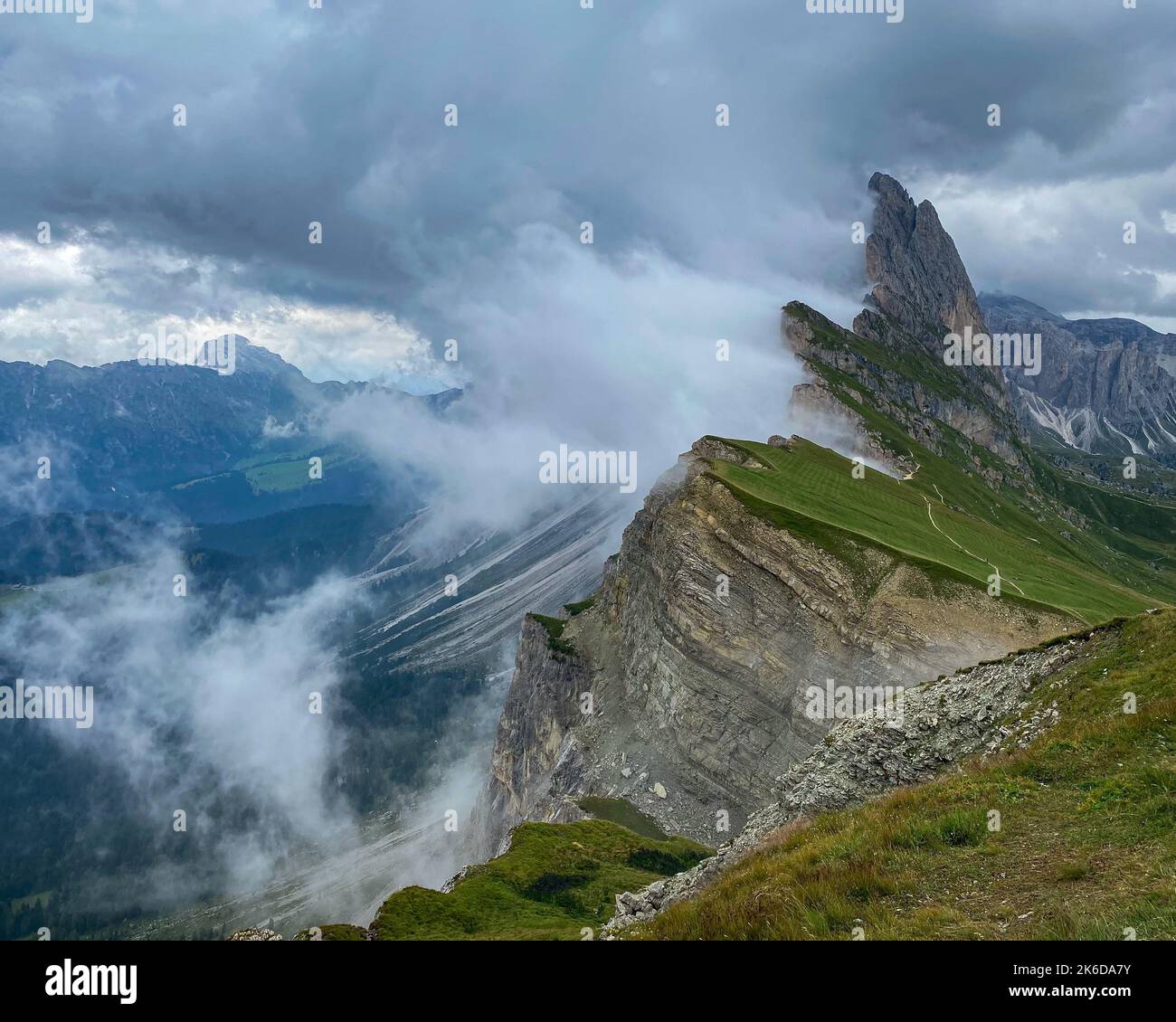 A landscape of mountain ranges covered in clouds Stock Photo - Alamy