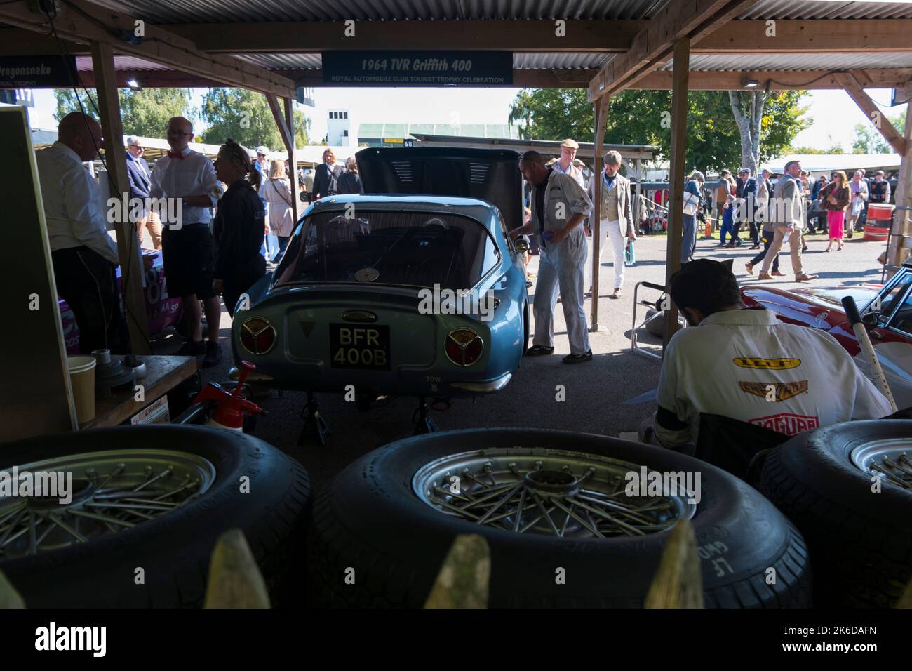 Mechanics working on a blue 1964 TVR Griffith 400 RAC TT Celebration ...