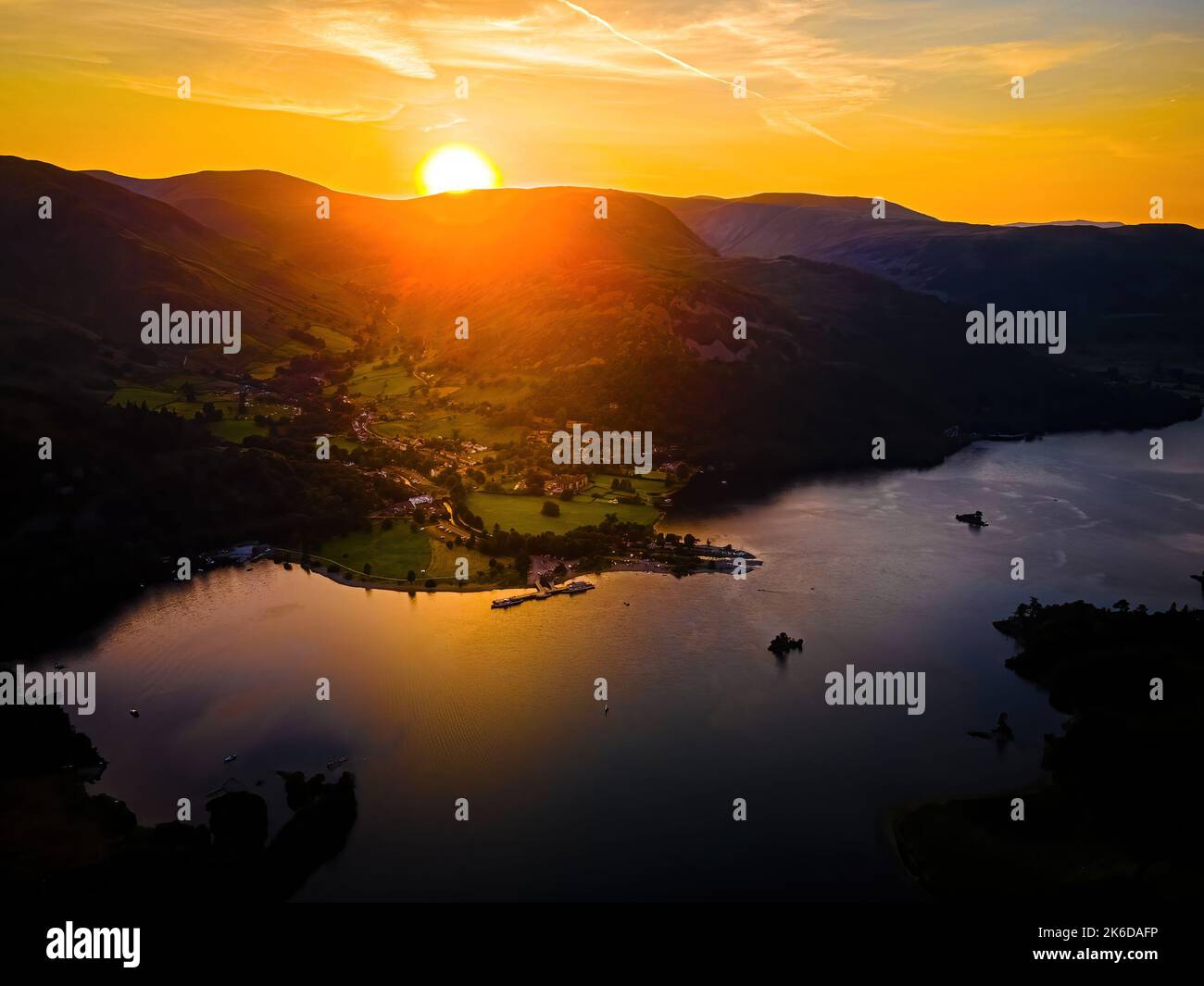Aerial view of sunset over Ullswater lake in Lake District, a region ...