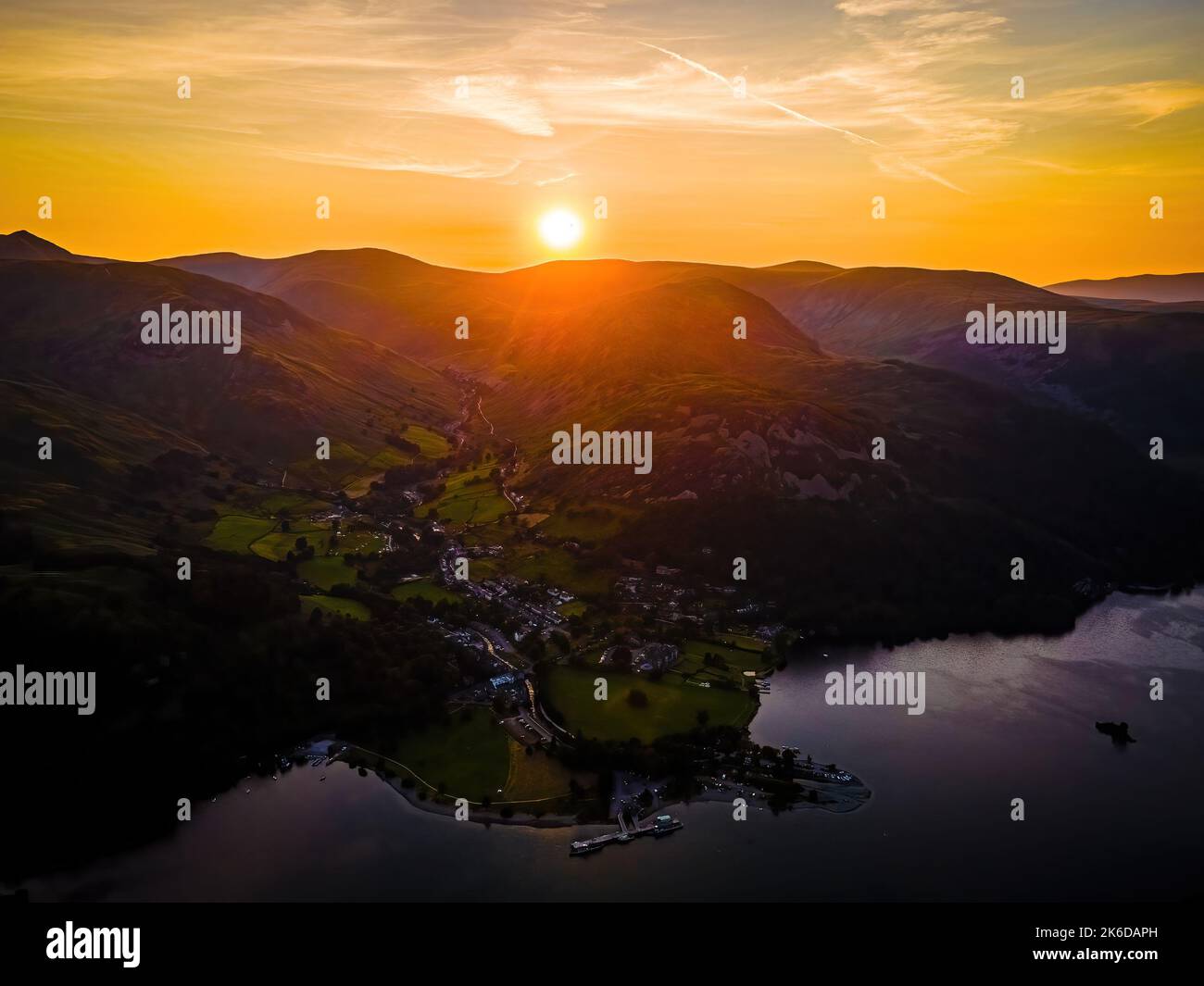 Aerial view of sunset over Ullswater lake in Lake District, a region ...