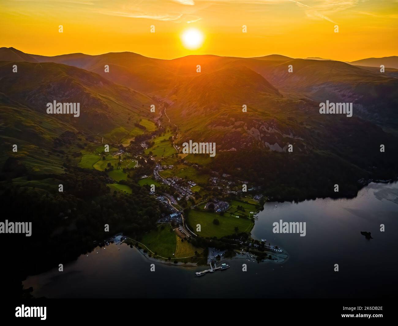 Aerial view of sunset over Ullswater lake in Lake District, a region ...