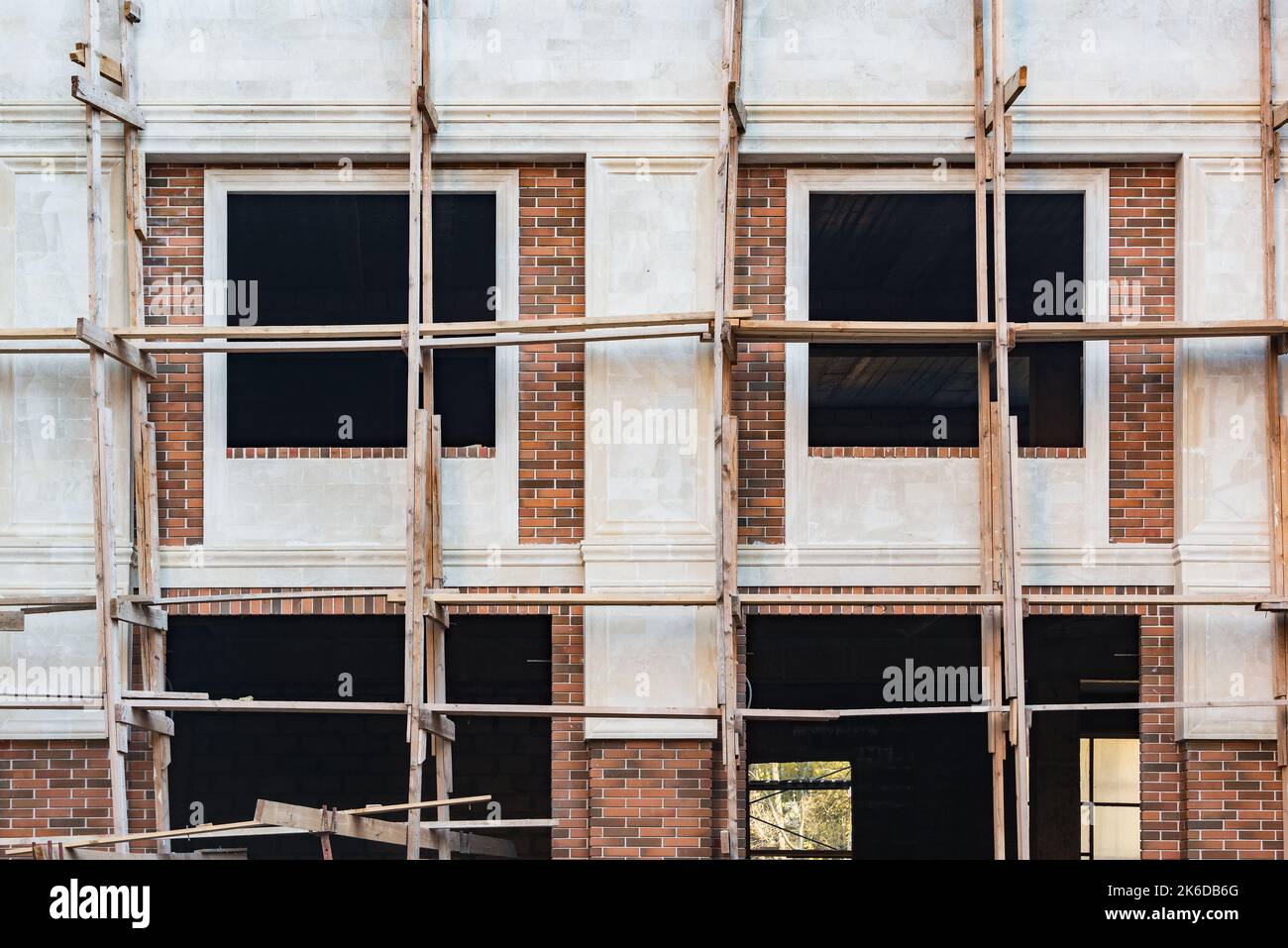 Scaffolding of the rich house at construction time Stock Photo - Alamy