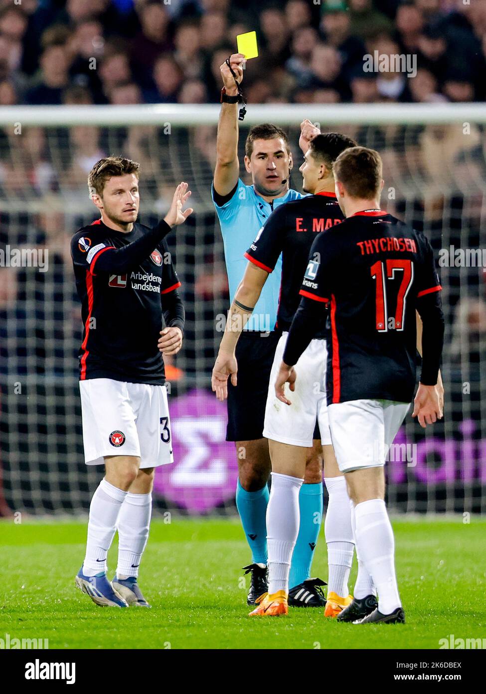 ROTTERDAM, NETHERLANDS - OCTOBER 13: Referee Rade Obrenovic shows ...