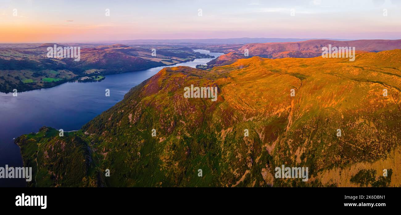 Aerial view of sunset over Ullswater lake in Lake District, a region ...