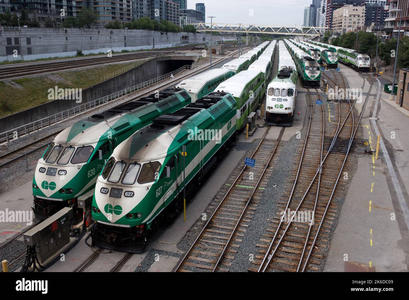 An aerial of seven tracks of passenger trains parked in downtown ...
