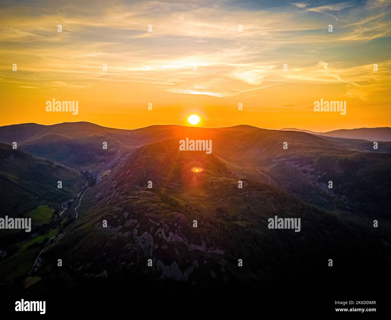 Aerial view of sunset over Ullswater lake in Lake District, a region ...