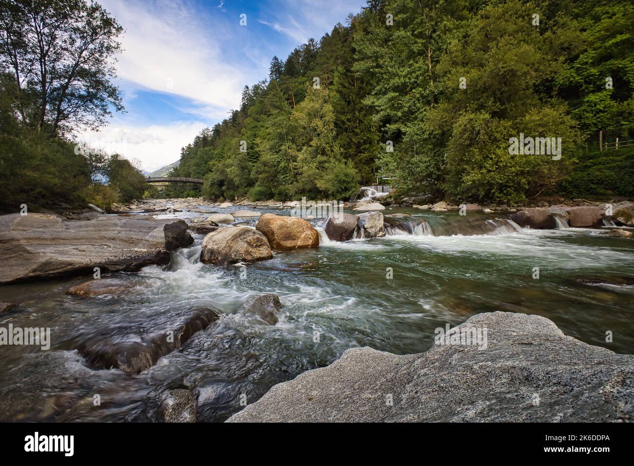 A beautiful rocky river in the green forest Stock Photo - Alamy