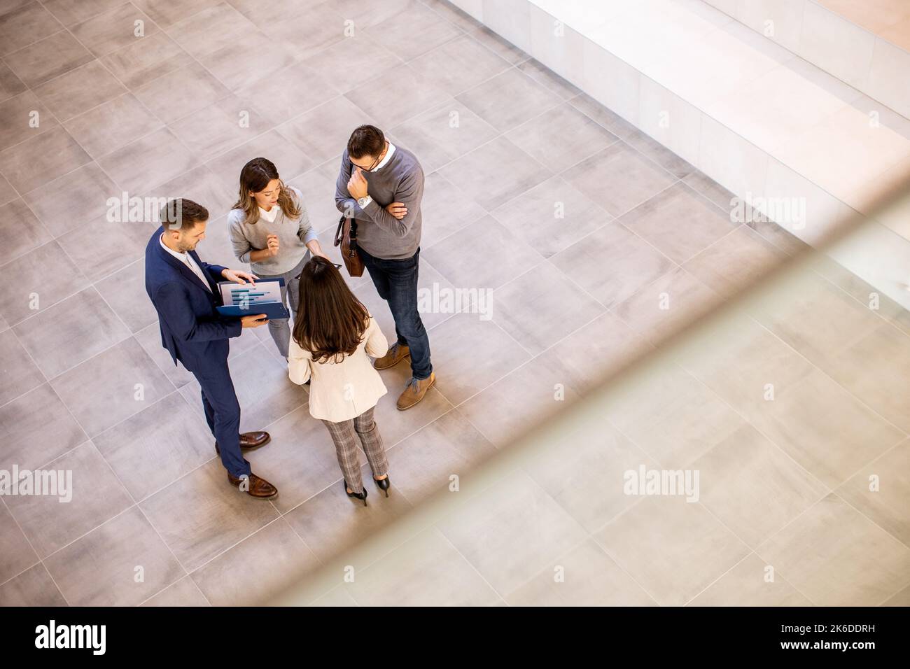 Four people talking aerial hi-res stock photography and images - Alamy