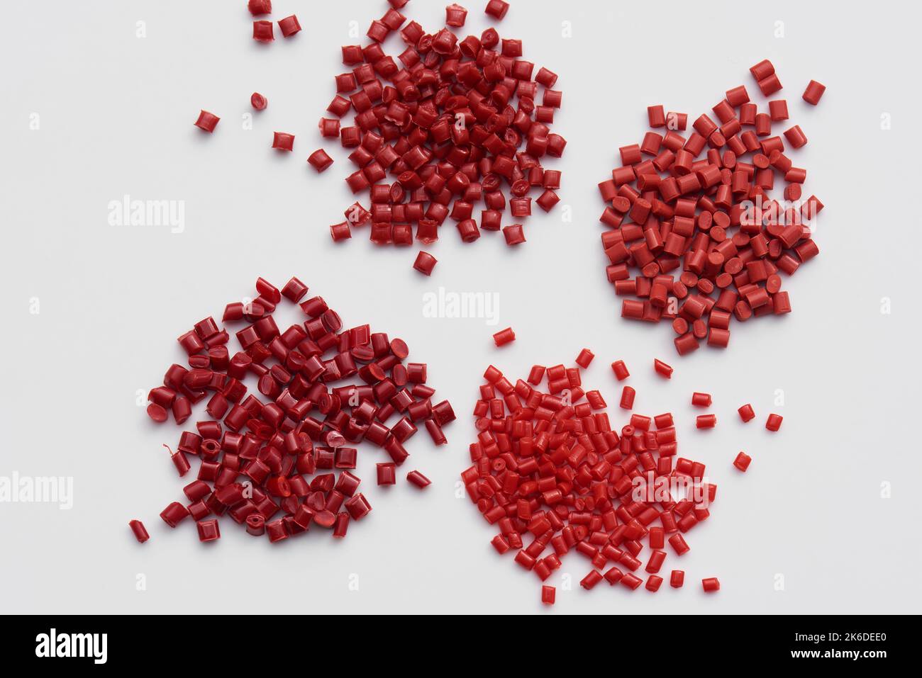 some red virgin materials of plastic resin granulates Stock Photo - Alamy