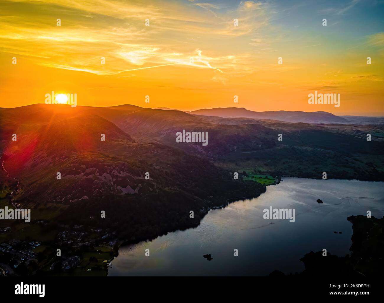 Aerial view of sunset over Ullswater lake in Lake District, a region ...